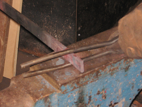 Here you can see the 'spring' end of the fuller, which curves around ...